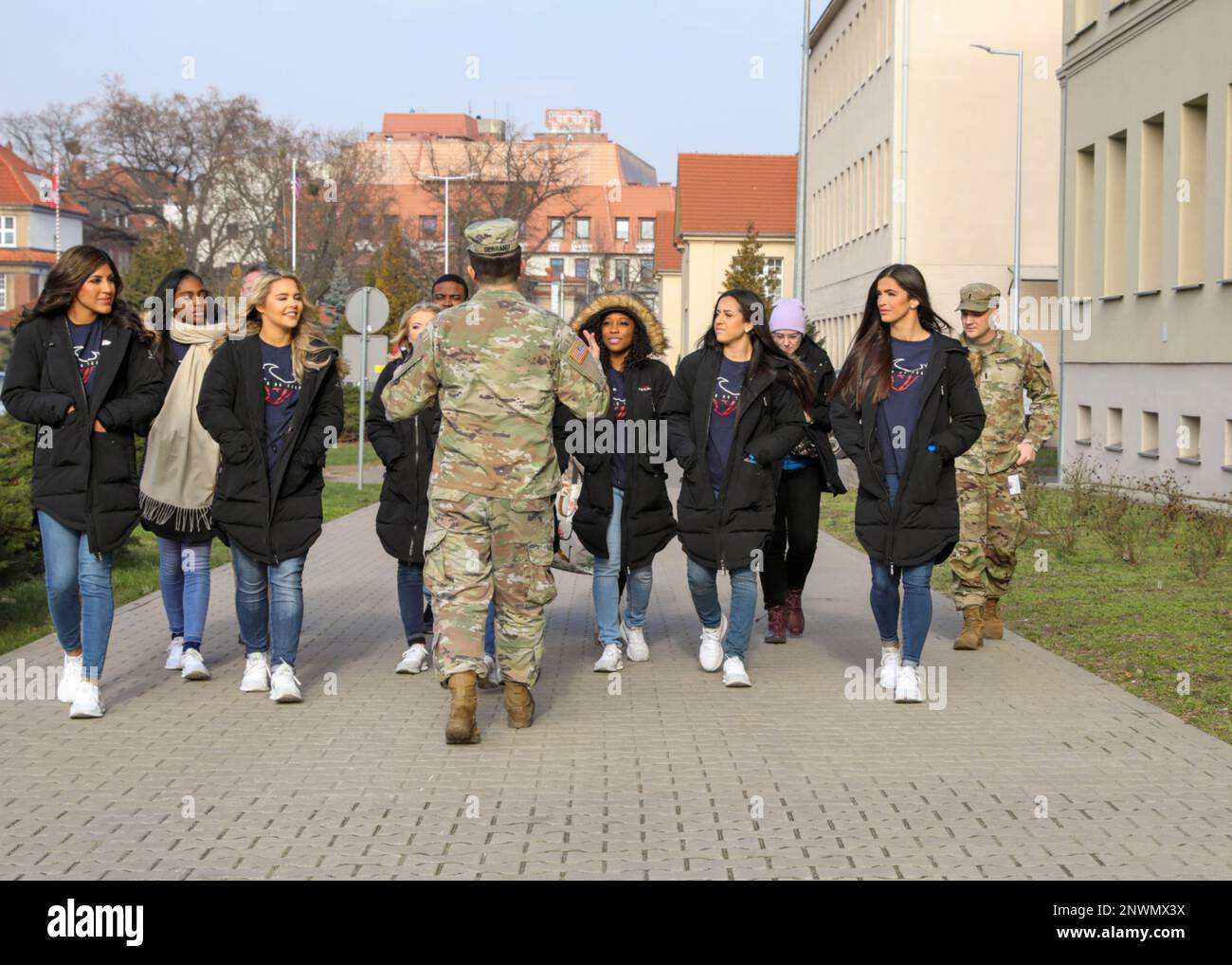 Houston Texans cheerleaders tour the base at Camp Kosciuszko, Poznan, Poland, Feb. 10, 2023. In ...