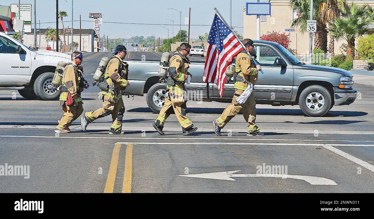 Doing their version of The Beatles' "Abbey Road" album cover, Yuma Fire ...