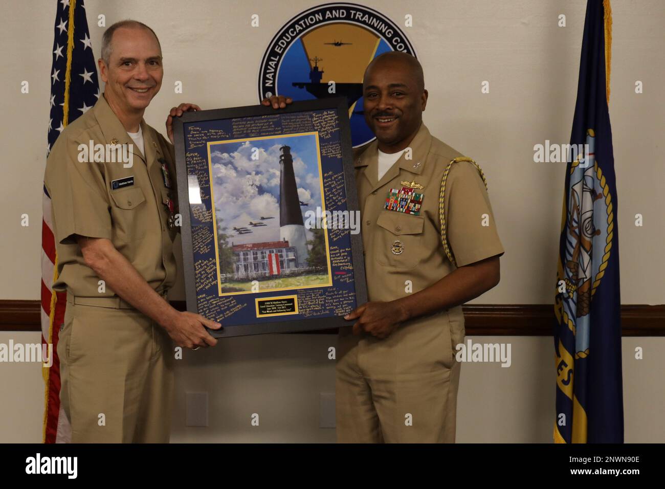 Capt. Cliff Collins, right, Naval Education and Training Command’s ...