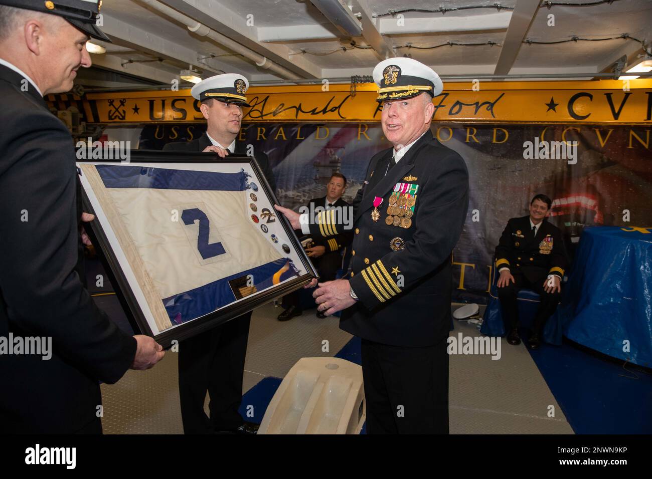 Staff Members of Destroyer Squadron (DESRON) 2 present Stefan Walch ...