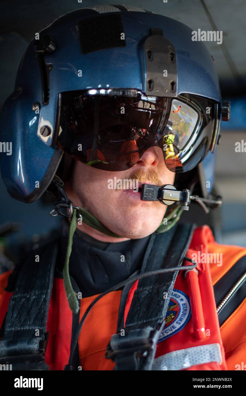 Petty Officer 2nd Class Richard Hoefle, a rescue swimmer assigned to ...