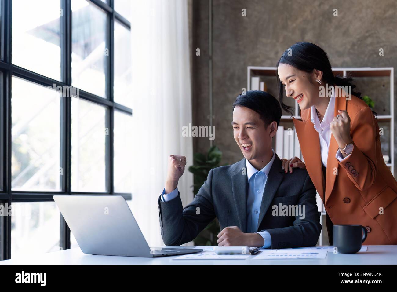 Happy smiling businessman feel happy work complete Teamwork success at ...