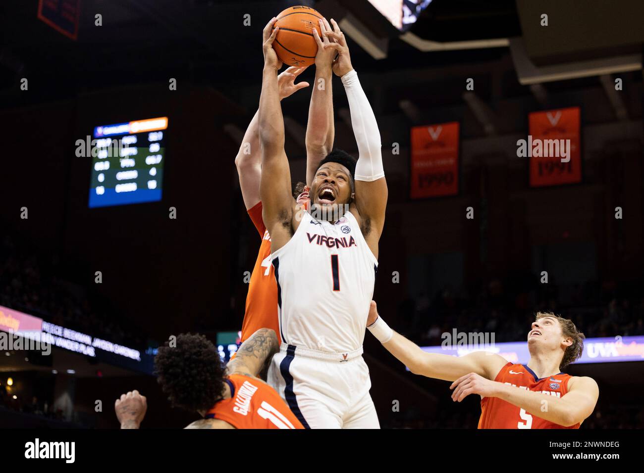 Virginia's Jayden Gardner (1) fights for a rebound against Clemson ...