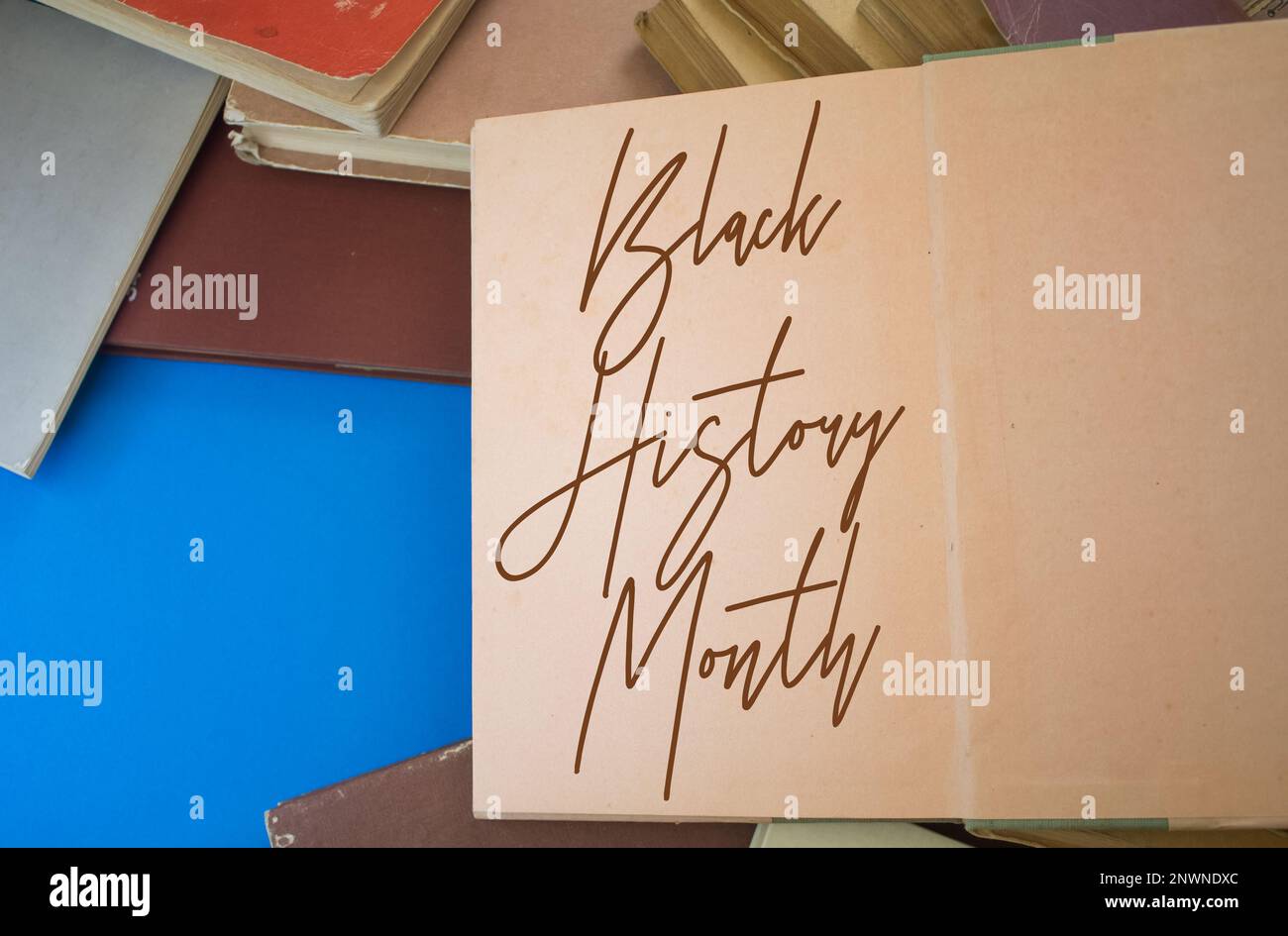 Black History Month word in opened book with vintage, natural patterns ...