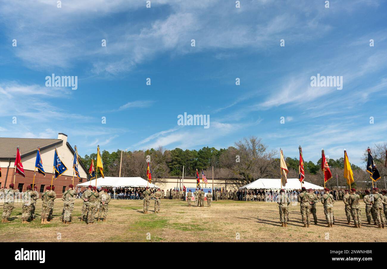 Attendees sit facing the 82nd Airborne Division command team and colors ...
