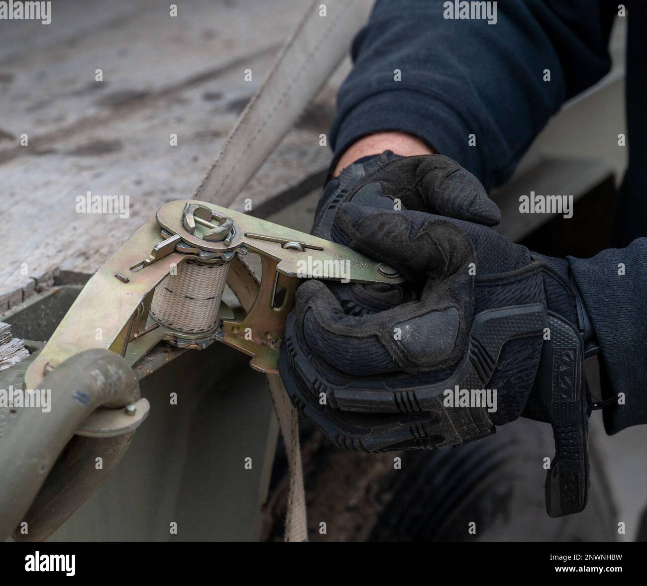 A security cabin is strapped down on a trailer at Ali Al Salem Air Base ...
