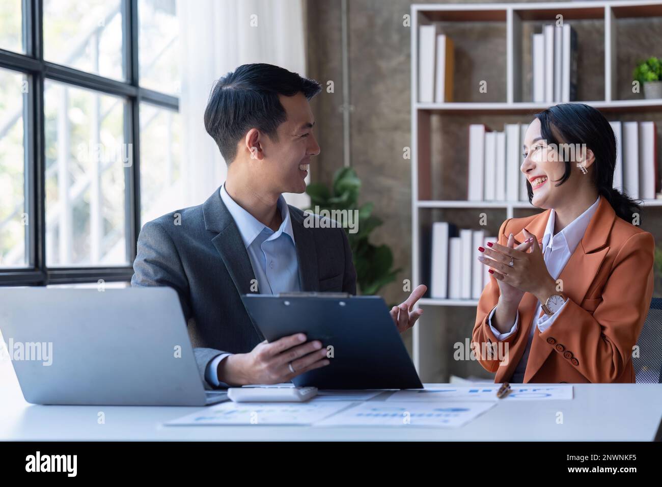 Happy smiling businessman feel happy work complete Teamwork success at ...