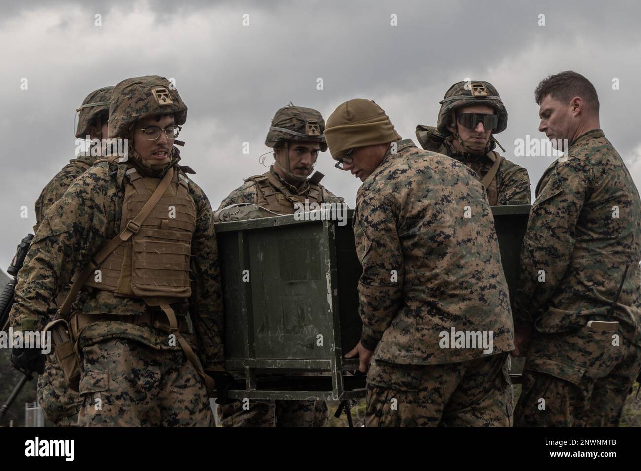 U.S. Marines with Combat Logistics Regiment 3 (CLR-3) load a 3,000 ...