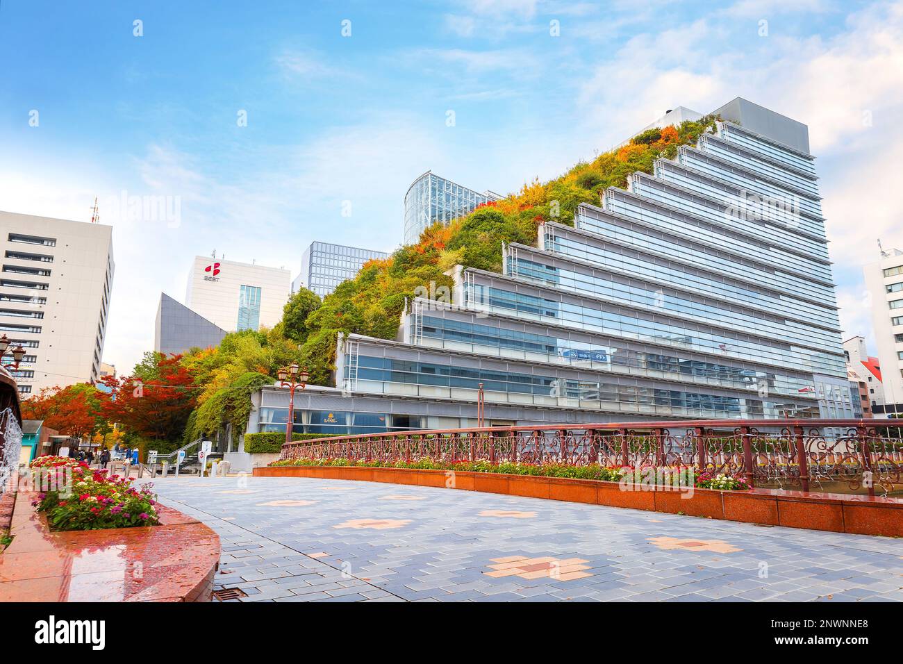 Fukuoka, Japan - Nov 21 2022: ACROS Fukuoka is a conventional office ...