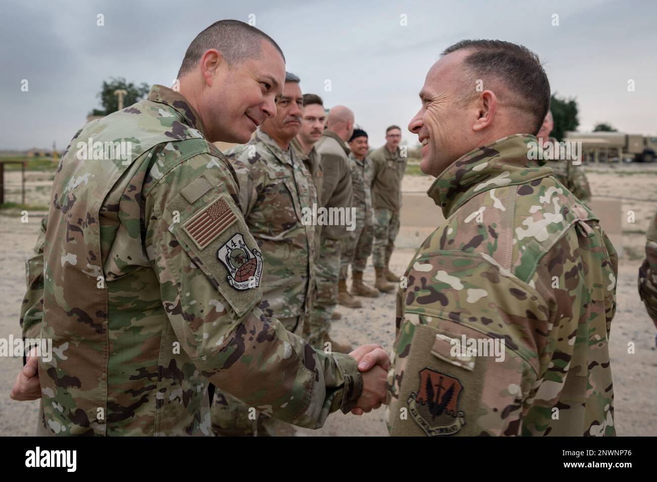 U.S. Air Force Command Chief Master Sgt. John Storms, right, Air Combat ...