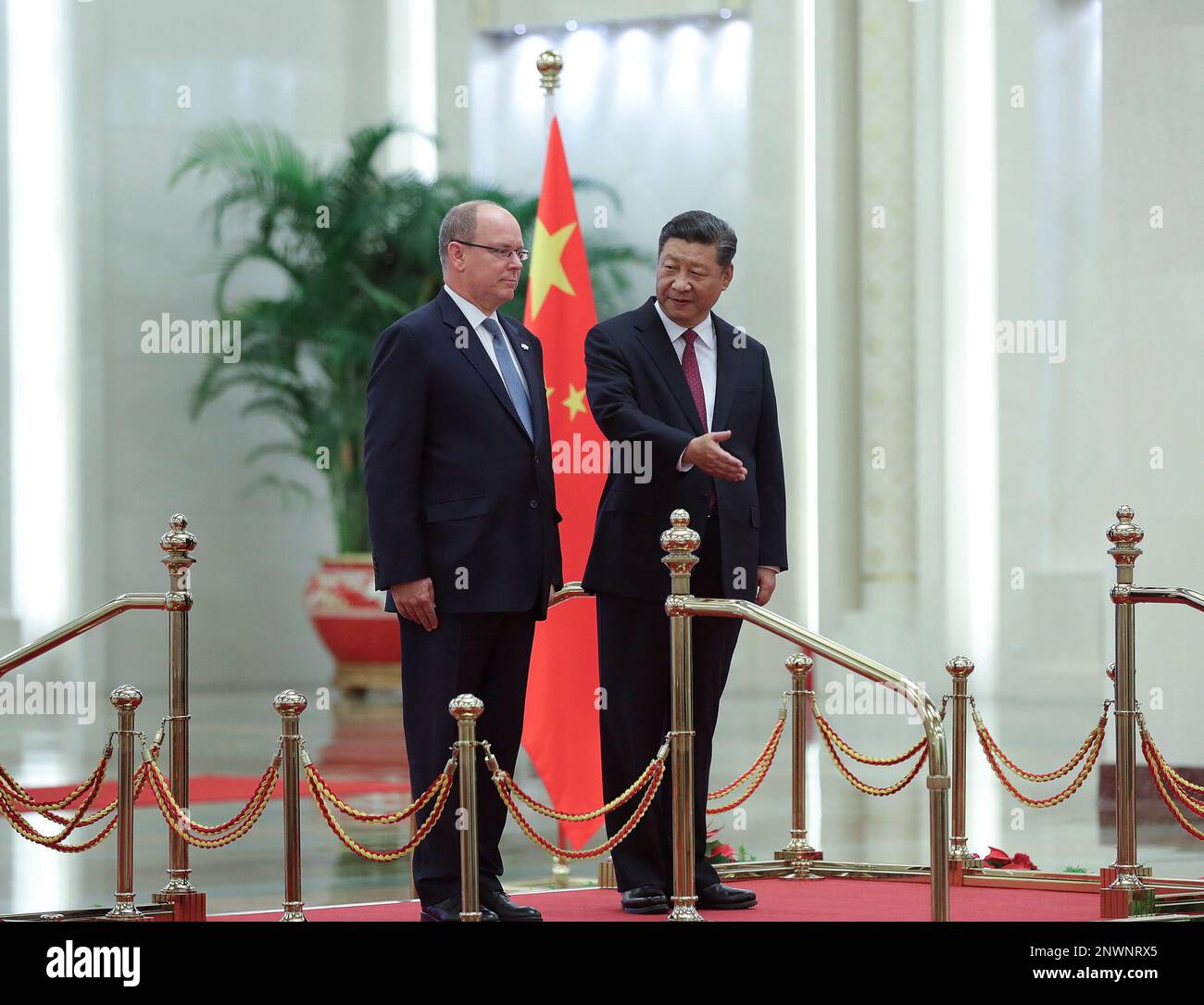 Chinese President Xi Jinping, right, invites Prince Albert II of Monaco ...