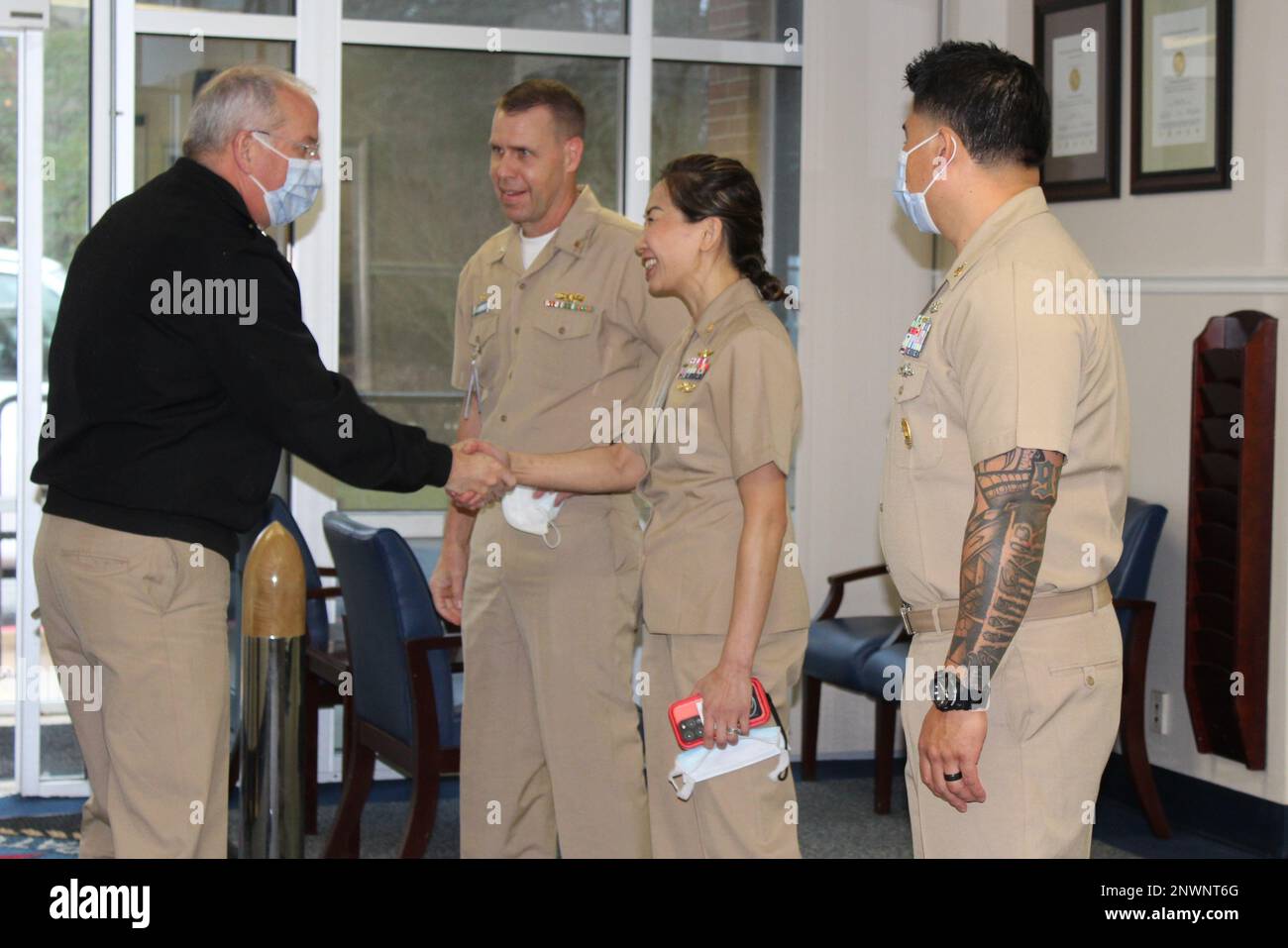 The leadership of Navy Medicine Readiness and Training Command Patuxent River greet Navy Surgeon ...