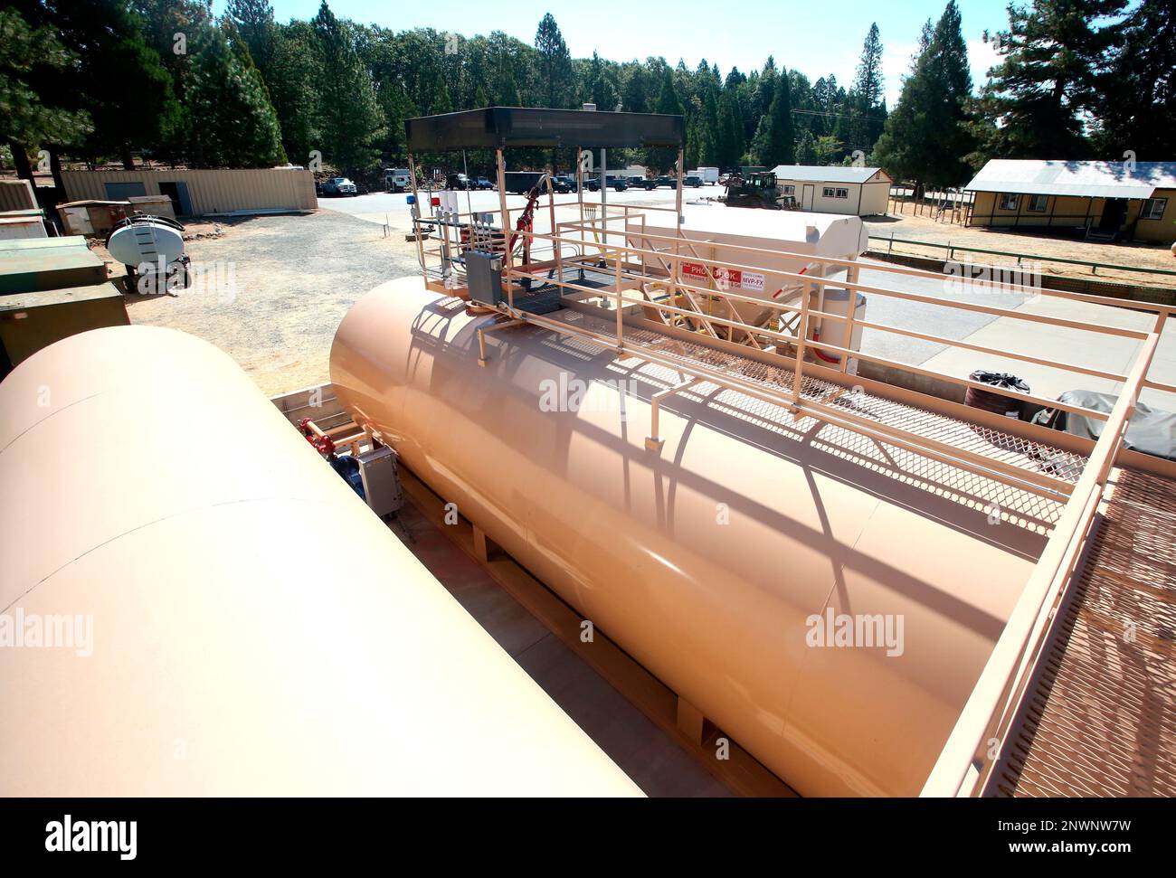 Fire retardant is mixed and stored from these three large tanks ...