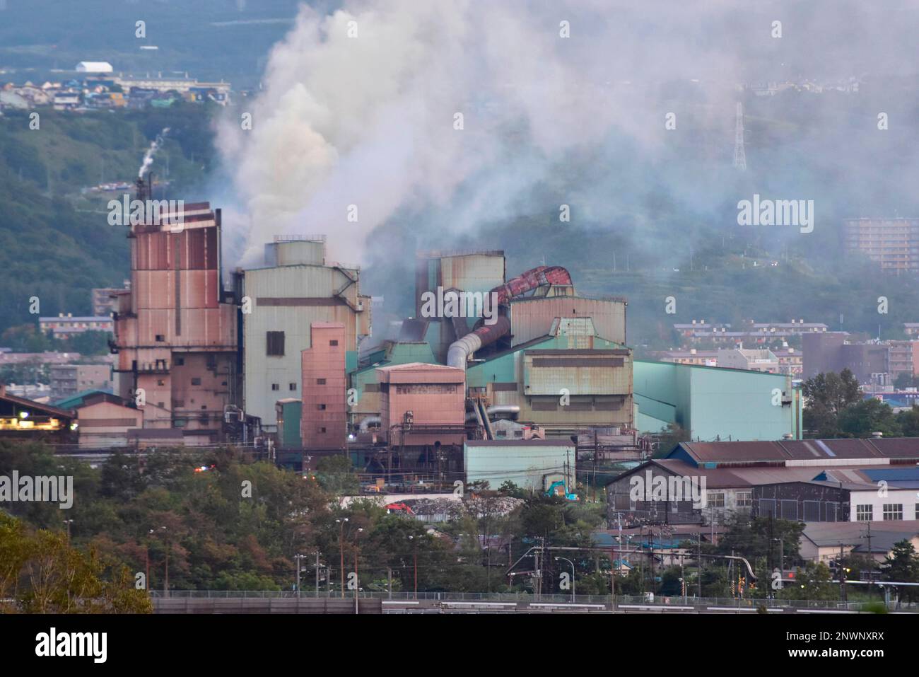 Smoke billows from the facilities of Mitsubishi Steel Muroran Inc ...