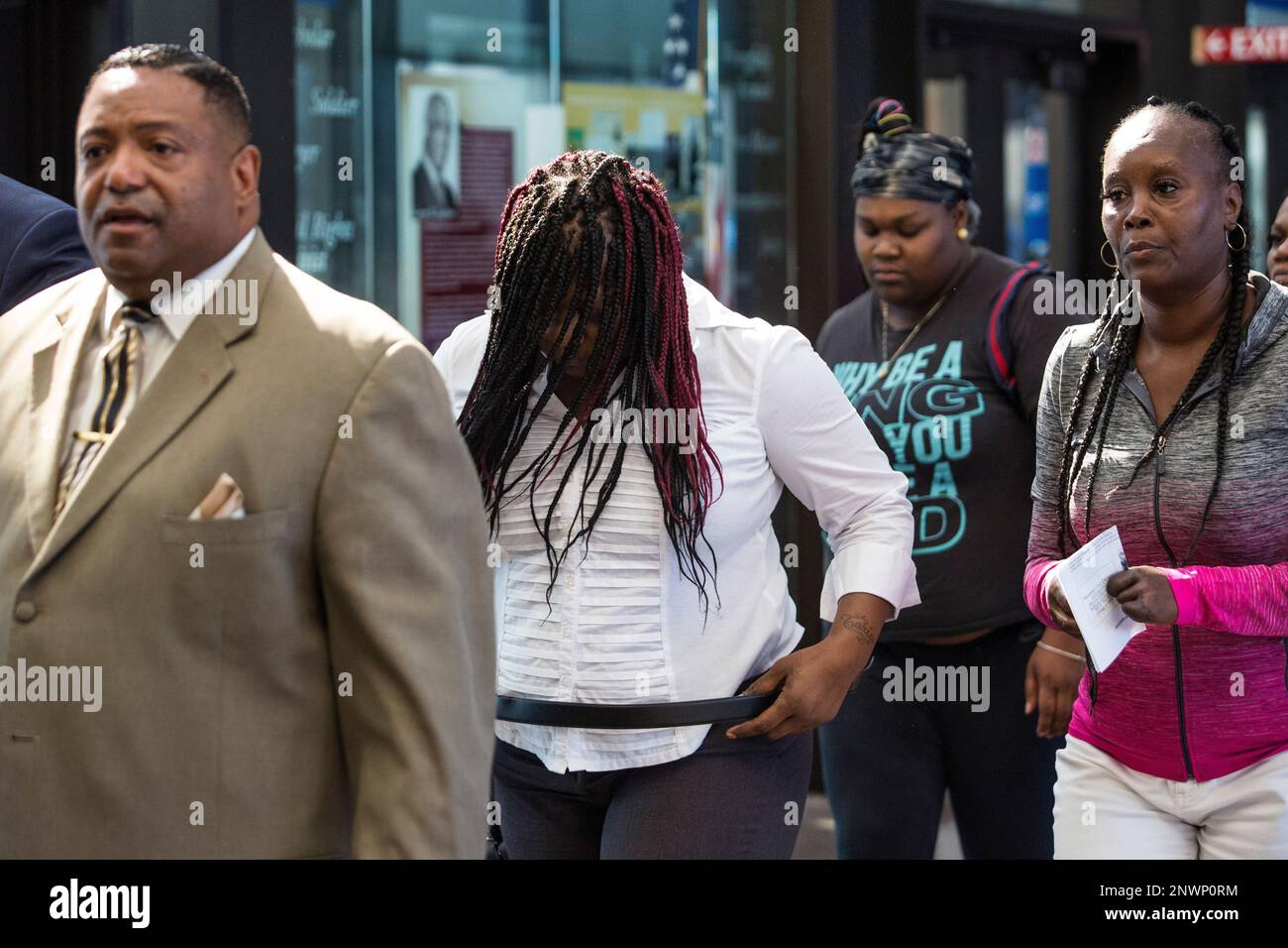 Laquan McDonald's mother, Tina Hunter, walks with family into the ...