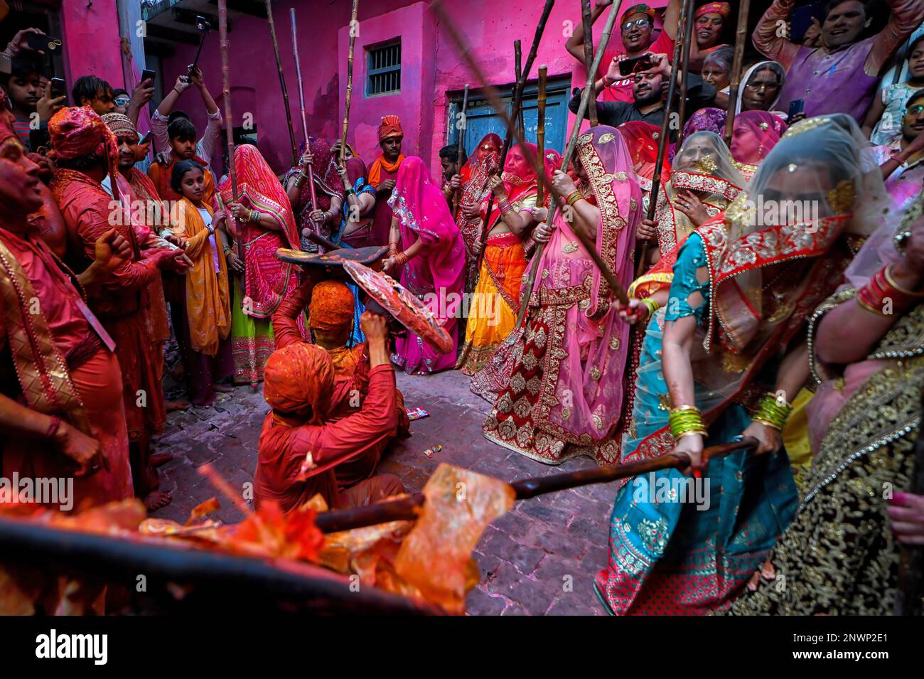 Hindu men are being ritually beaten with sticks (Lathi) during the ...
