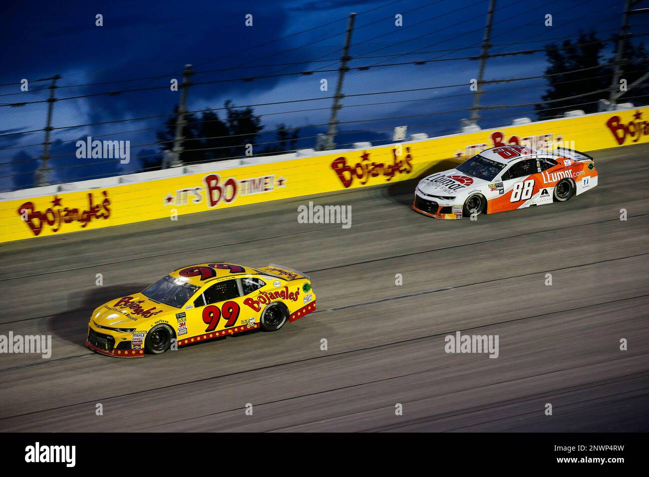 Derrike Cope (99) and Alex Bowman (88) during the Monster Energy NASCAR ...