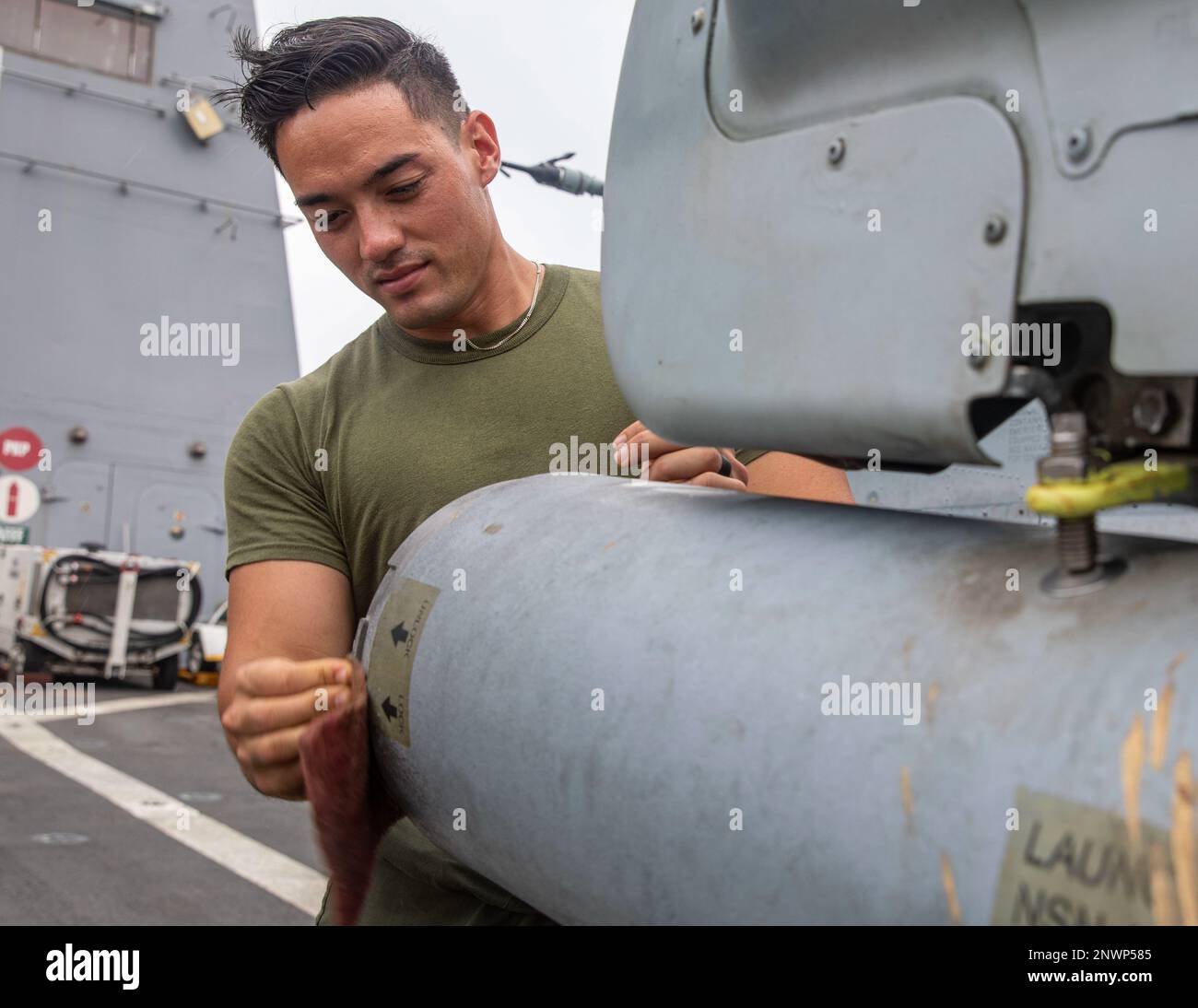 PACIFIC OCEAN (Jan. 2, 2023) - U.S. Marine Corps Sgt. Randall Miks, an ...
