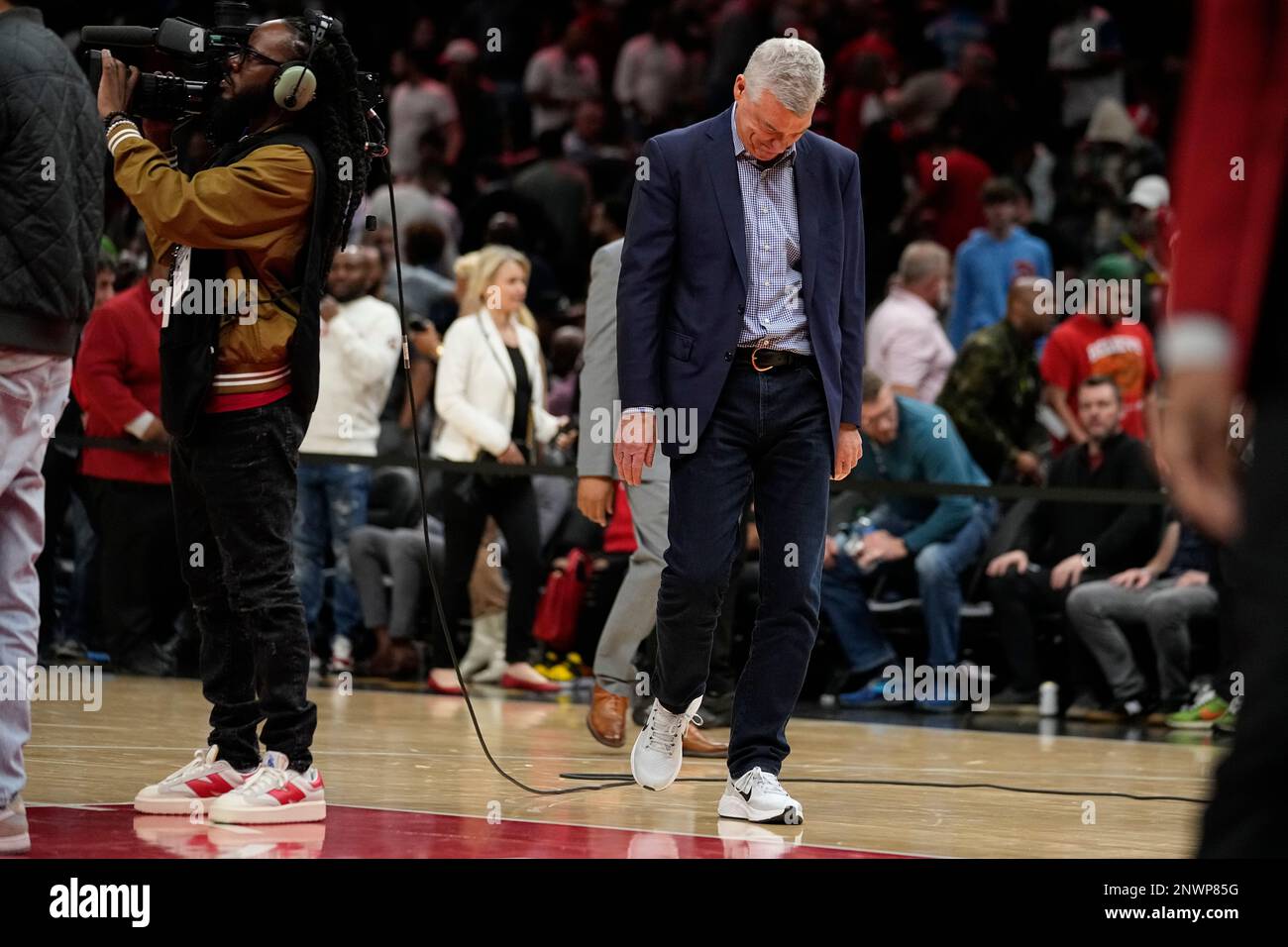 Atlanta Hawks owner Tony Ressler walks across the court after the Hawks ...