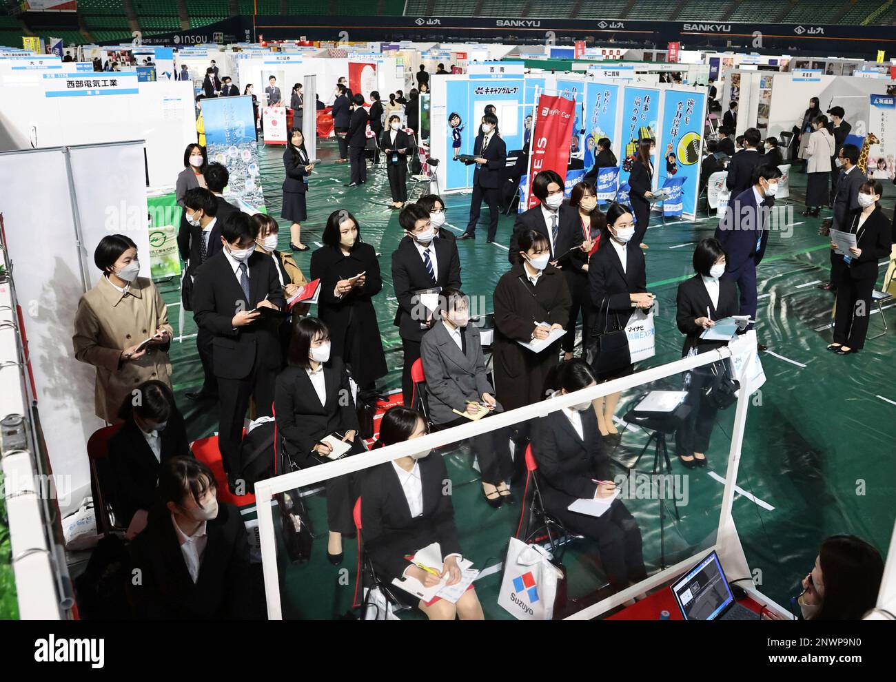 University students and others attend a job fair in Fukuoka on March 1 ...
