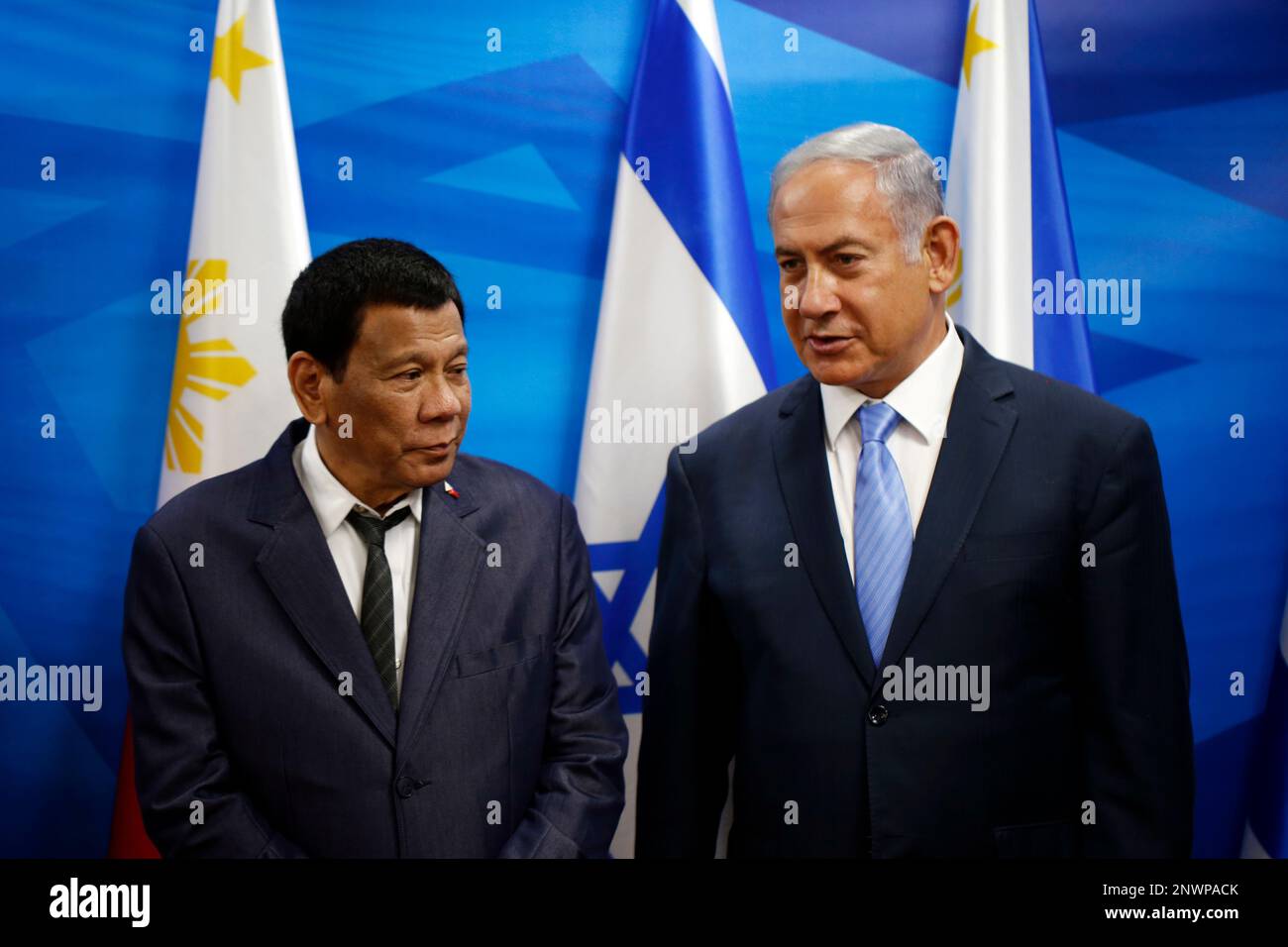 Israeli Prime Minister Benjamin Netanyahu, right, stands next to ...
