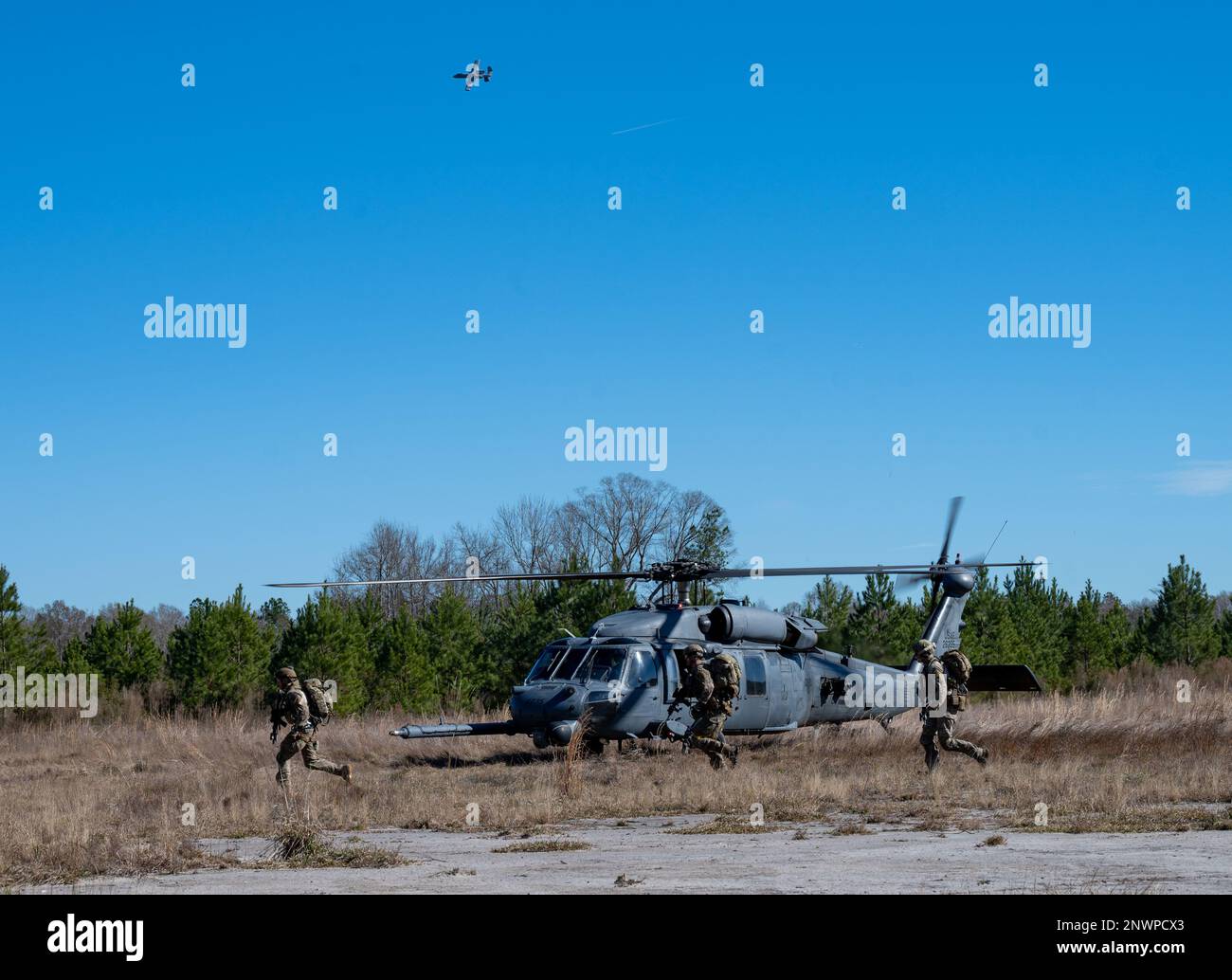 920th Rescue Wing Pararescuemen run towards friendly forces during a ...