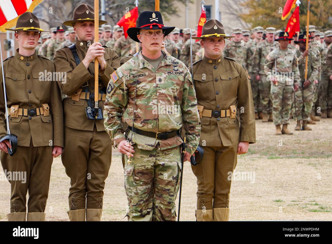 Command Sgt. Maj. Loyd Rhoades releases the colors in the formation ...
