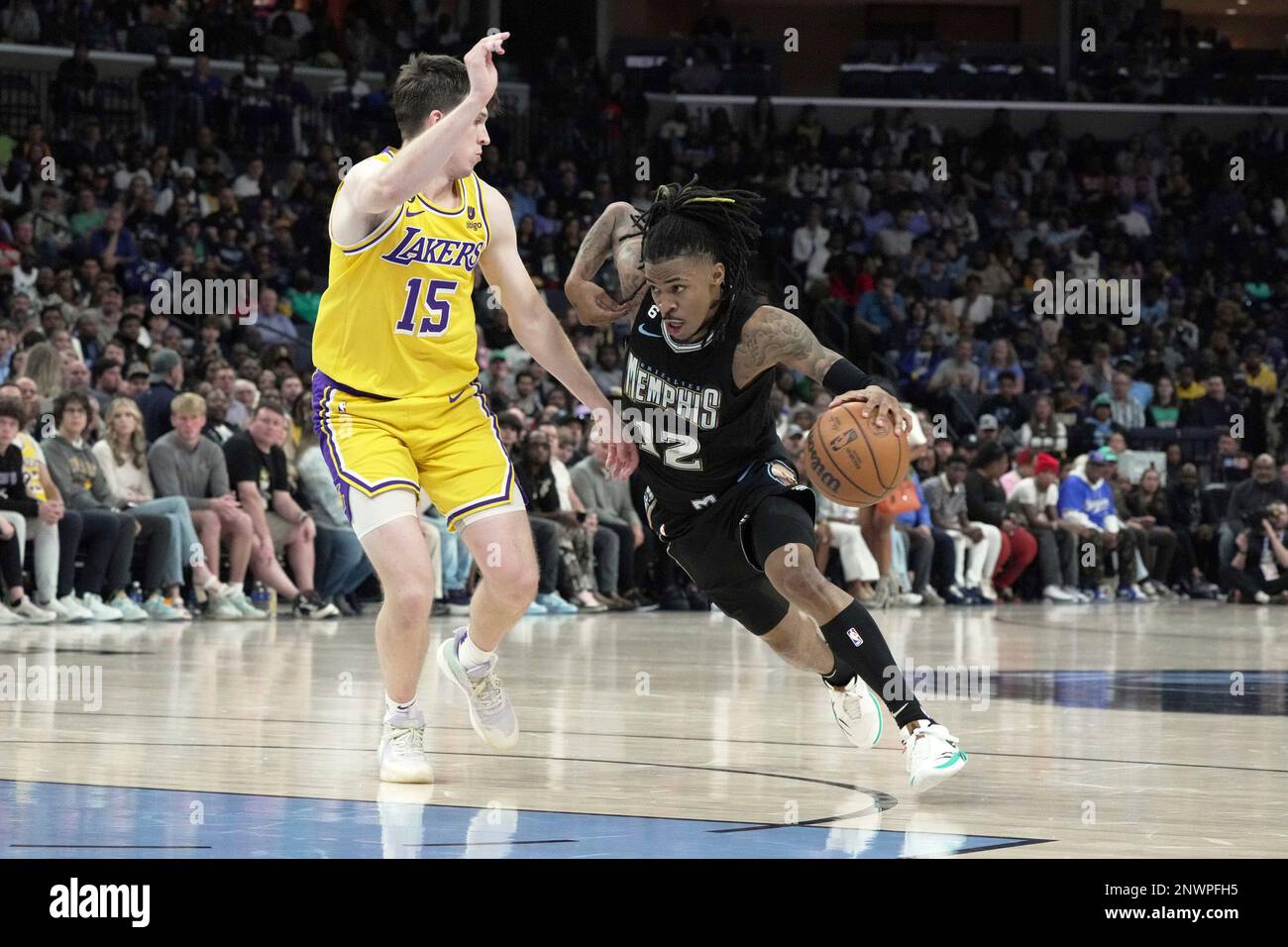 Memphis Grizzlies Ja Morant (12) drives to the basket as Los Angeles ...