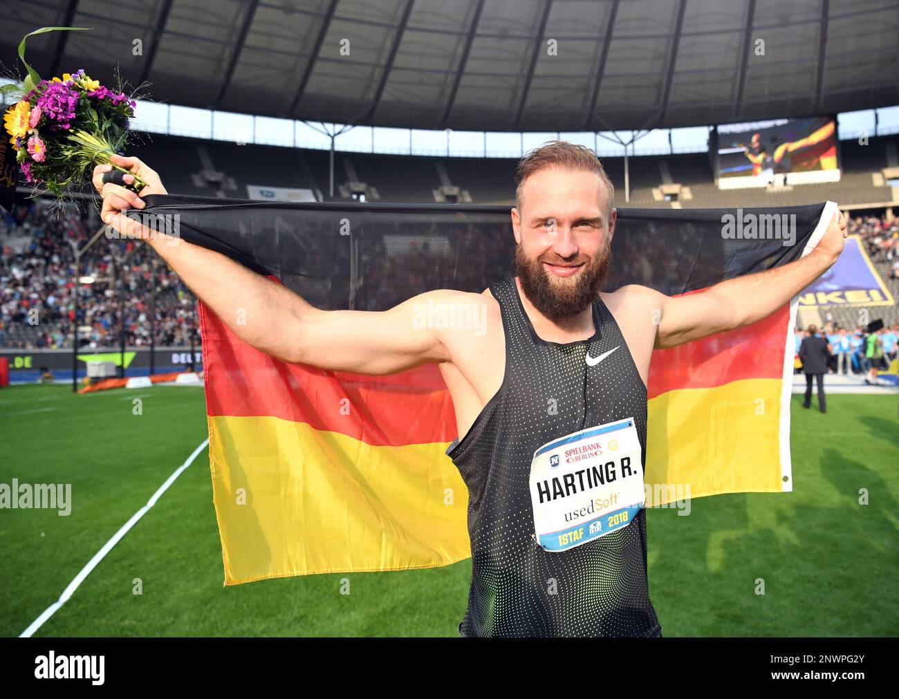 Olympic champion and multiple world champion Robert Harting poses with ...