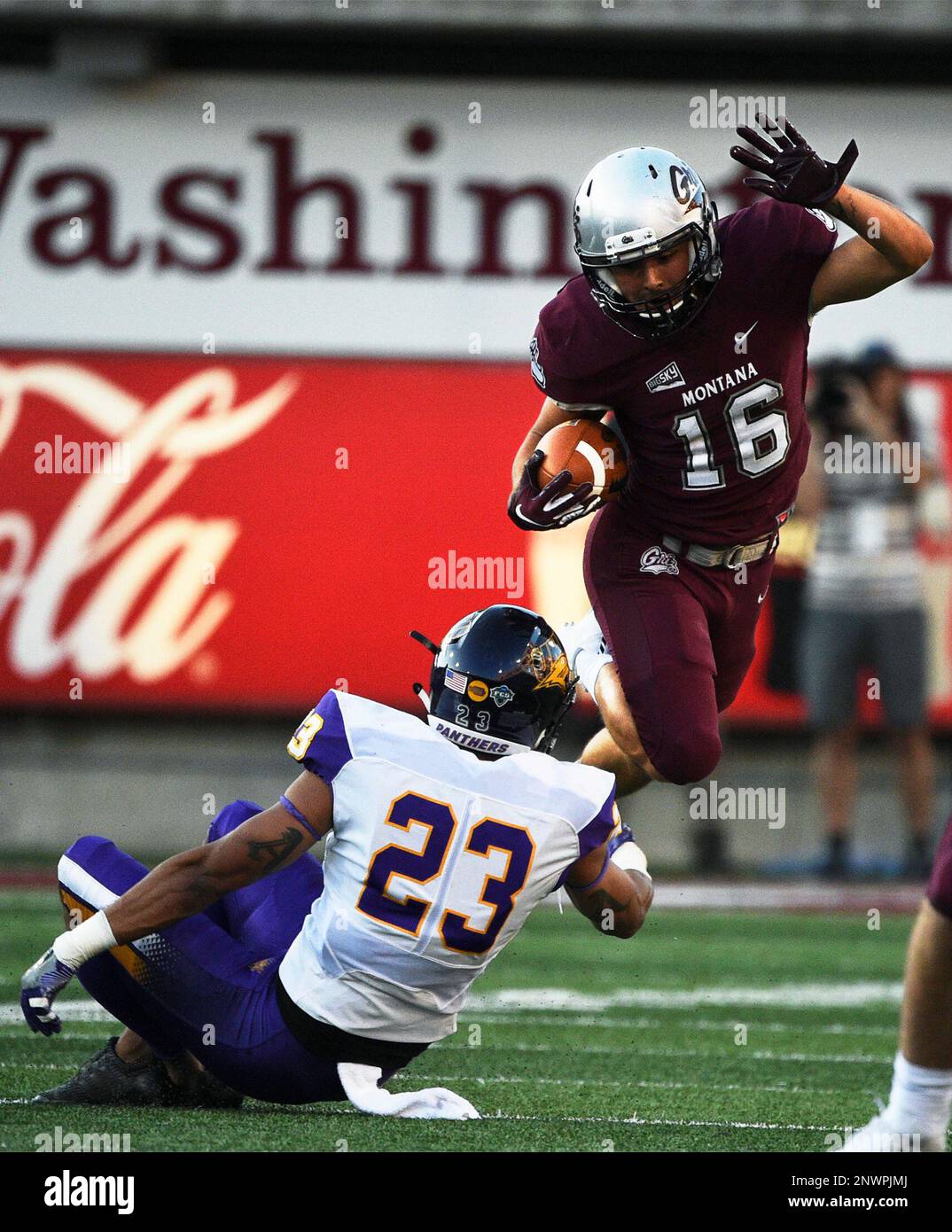 Montana wide receiver Jerry Louie-McGee (16) hurdles Northern Iowa ...