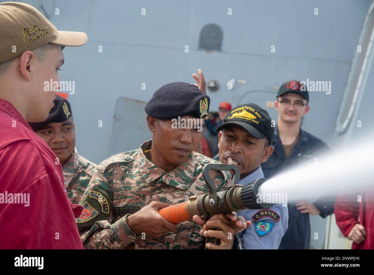 DILI, Timor-Leste (Feb. 15, 2023) Sailors aboard amphibious transport ...