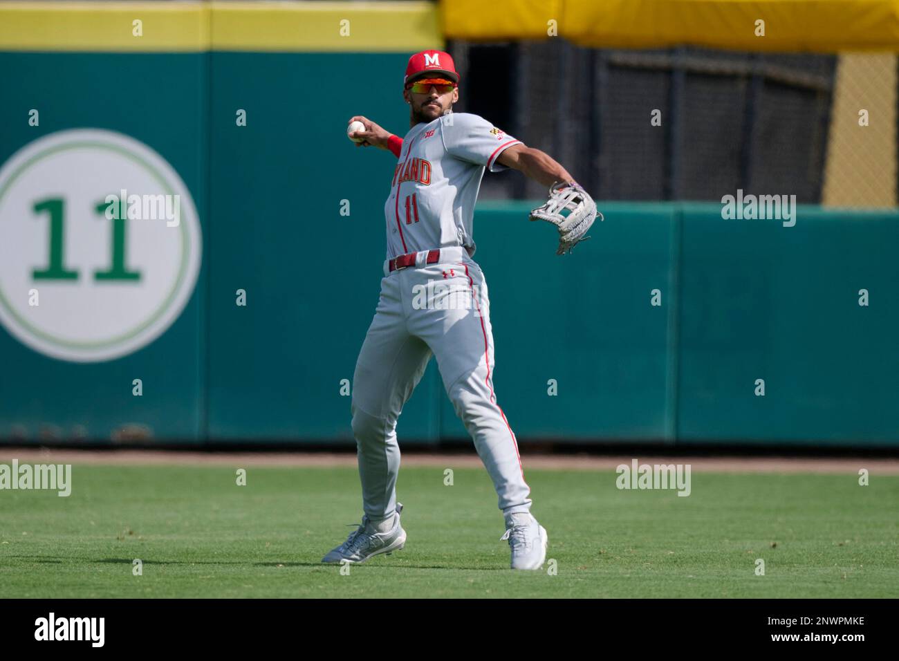 Maryland Terrapins outfielder Elijah Lambros (11) throwing during an ...