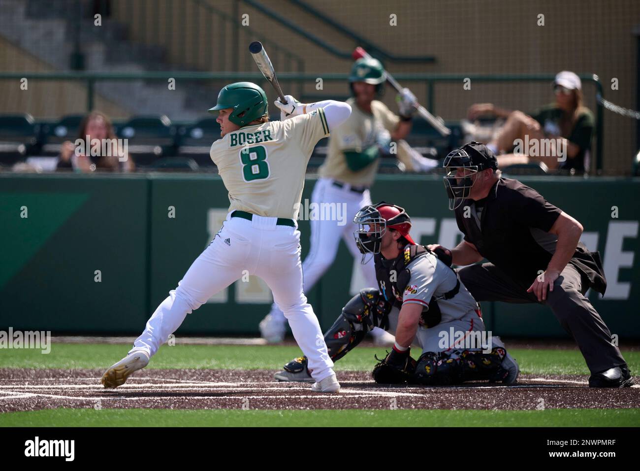 USF Bulls Bobby Boser (8) bats in front of catcher Luke Shliger (3) and ...