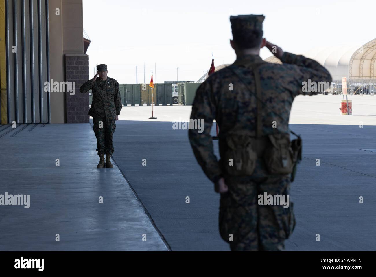 U.S. Marine Corps Lt. Col. Benjamin Schmidt, left, on-coming commanding ...