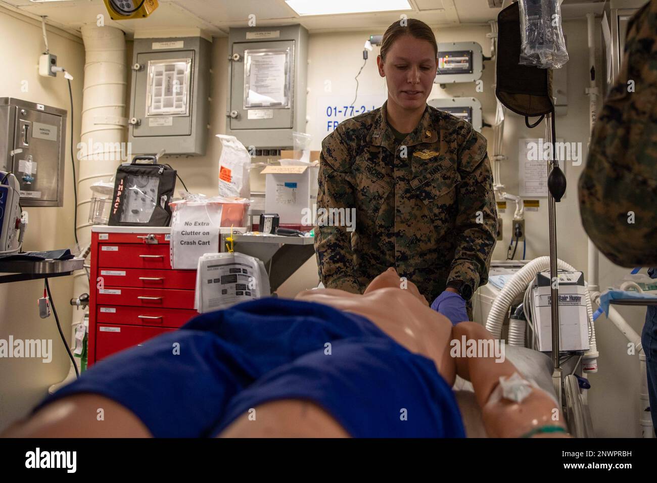 230211-N-YR119-1048 Lt. Alexandra Fischer, a physician’s assistant with ...