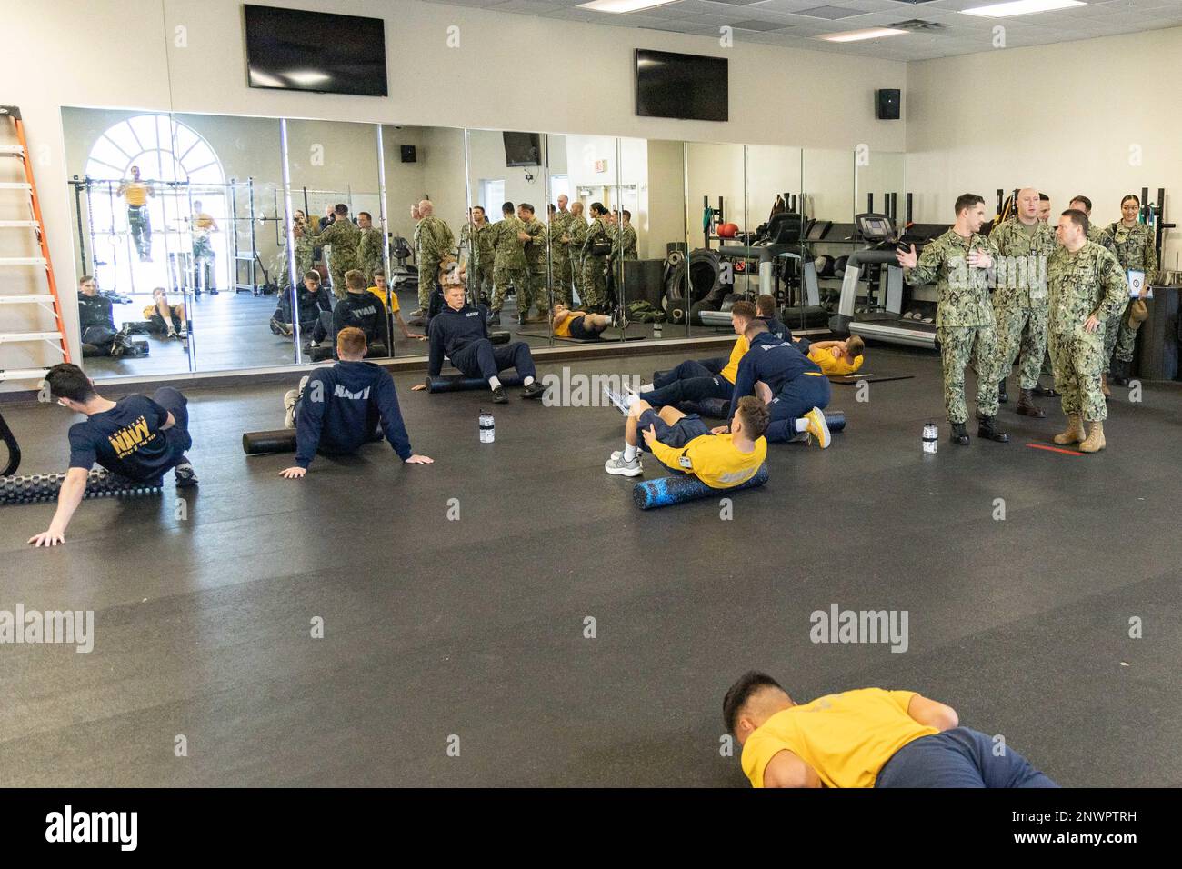 Chief of Naval Personnel Vice Adm. Rick Cheeseman, center-right, is ...