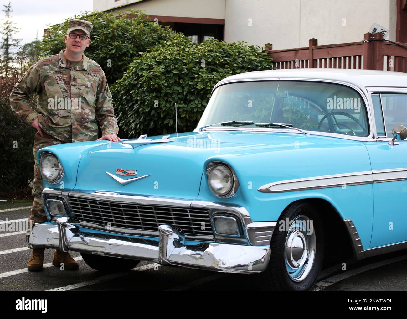 Command Sgt. Maj. Andrew Larkin poses with his family heirloom, a 1956 Chevy Bel-Air, loving ...