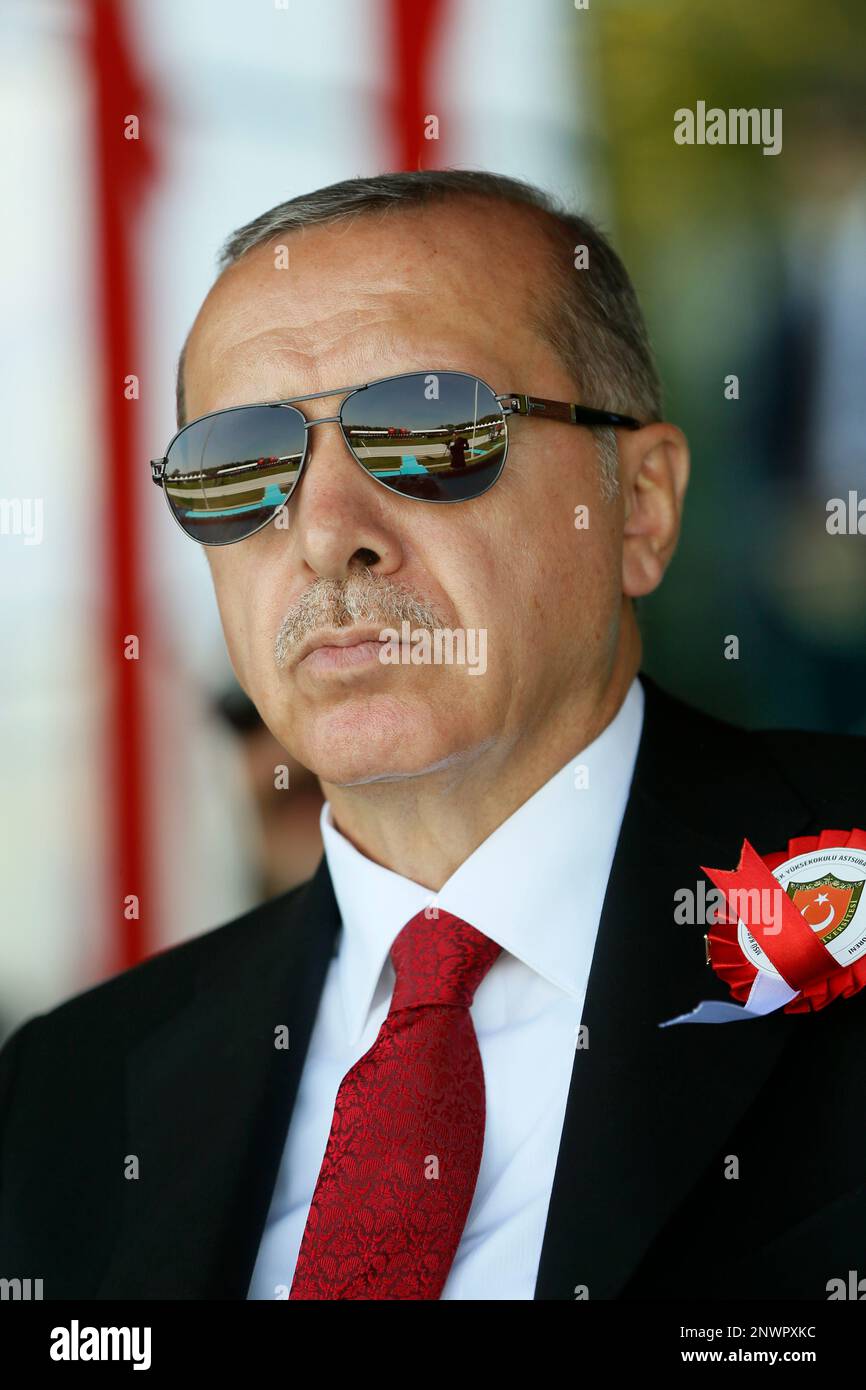 Turkey's President Recep Tayyip Erdogan attends a military graduation ...