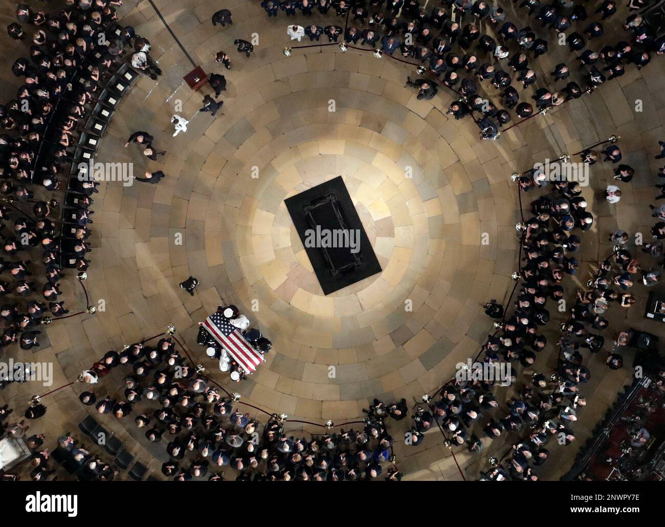 The flag-draped casket of Sen. John McCain, R-Ariz., is carried into ...
