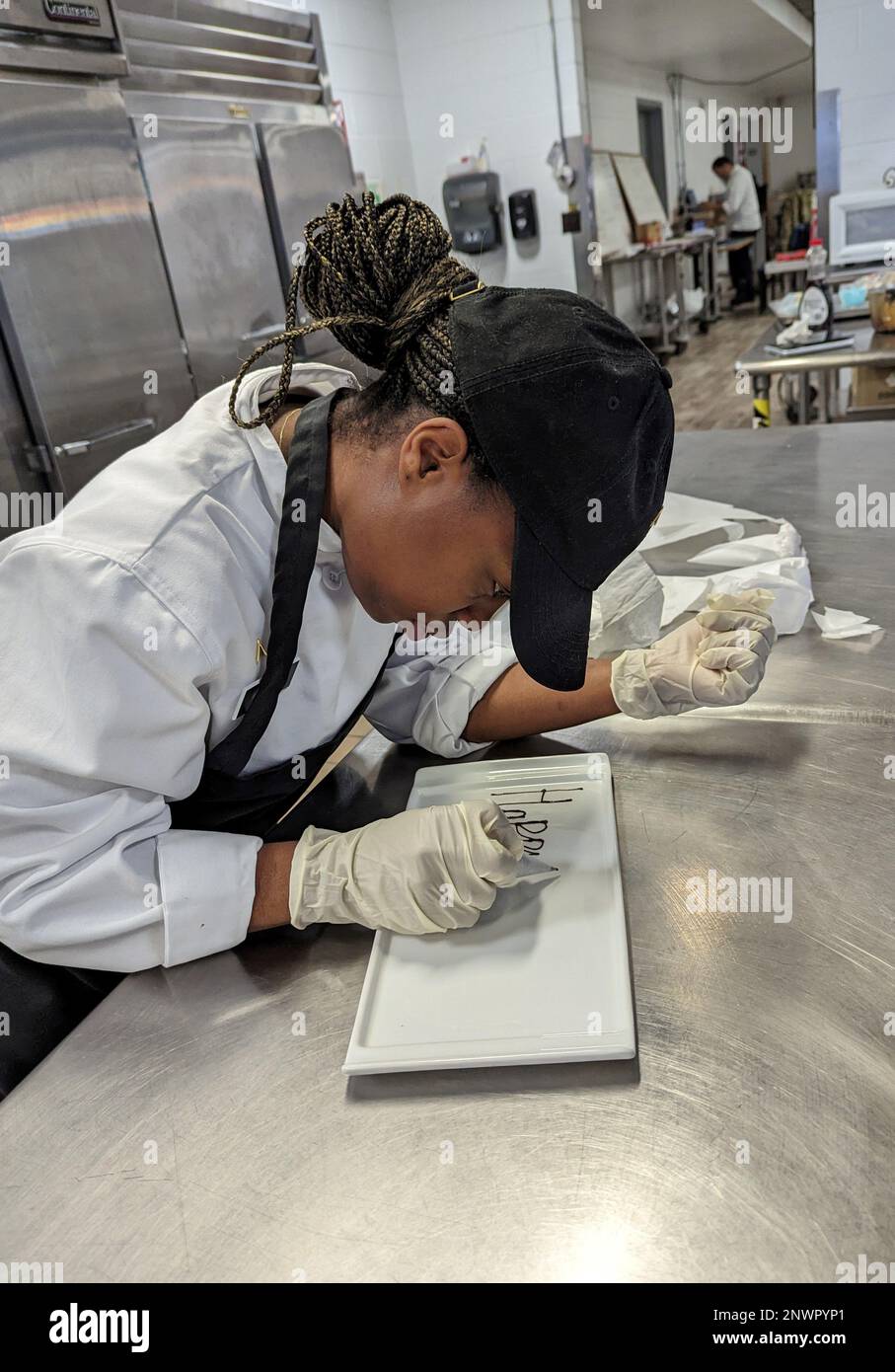 Pfc. Crystal Gordon practices chocolate lettering at the Fort Drum ...