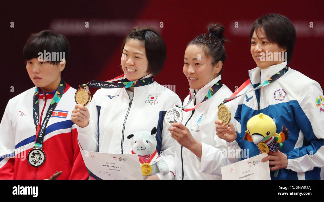 (L-R) North Korea's KIM Jin A, silver, Japan's Momo Tamaoki, gold, Mongol's Sumiya Dorjsuren and ...