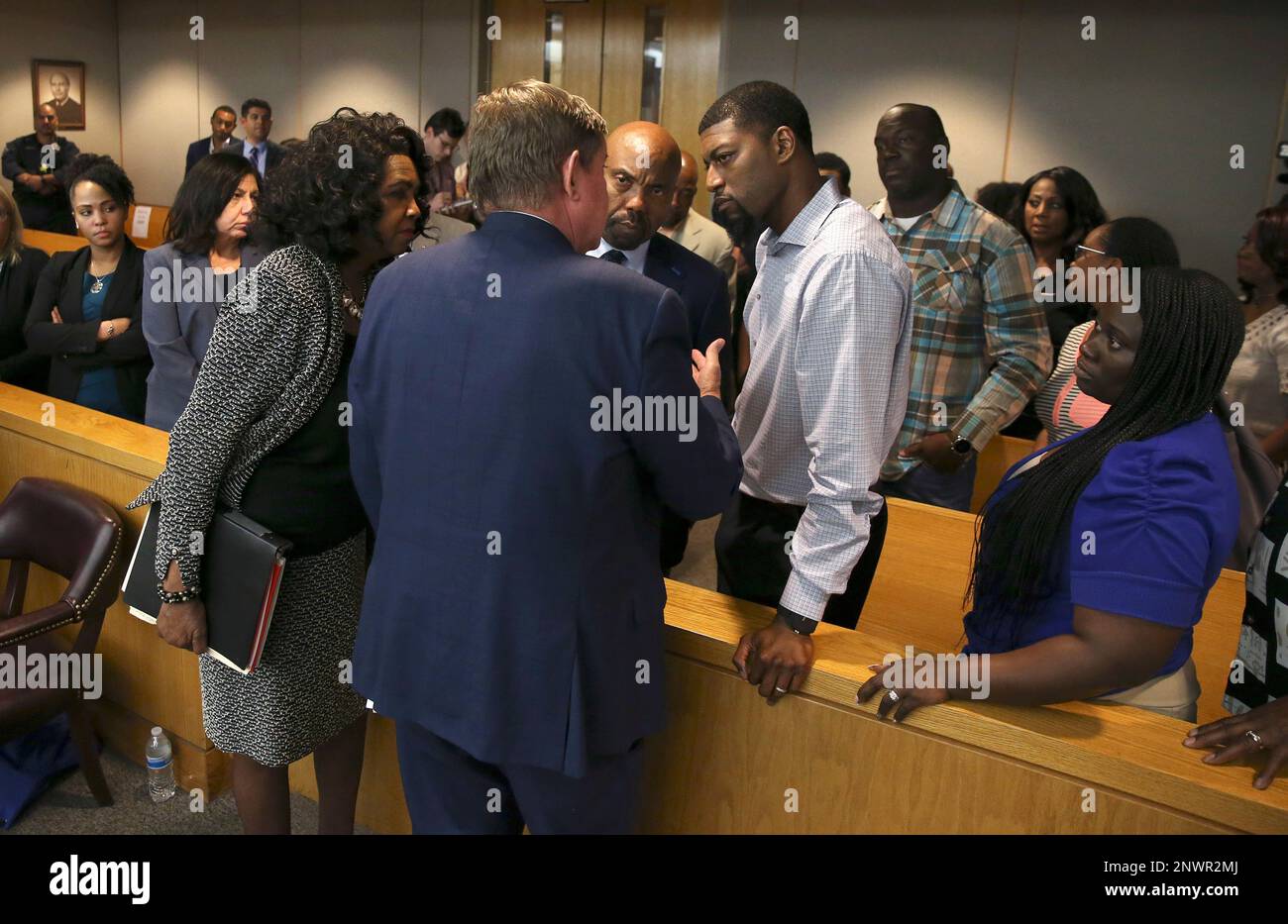 Lead prosecutor Michael Snipes, second from left, and Dallas County ...