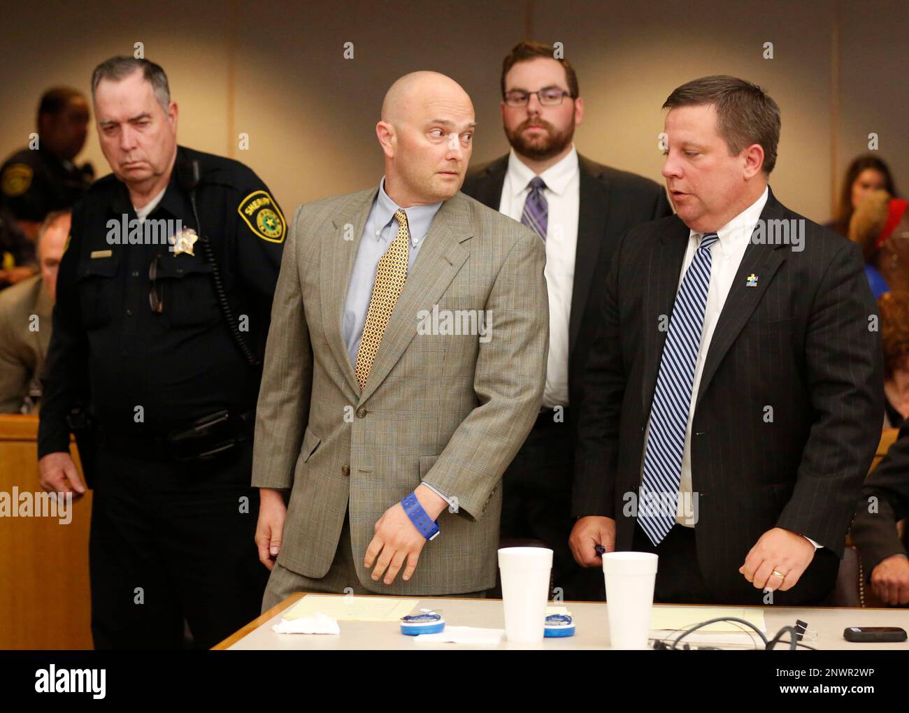Former Balch Springs Police Officer Roy Oliver, center, looks to his ...