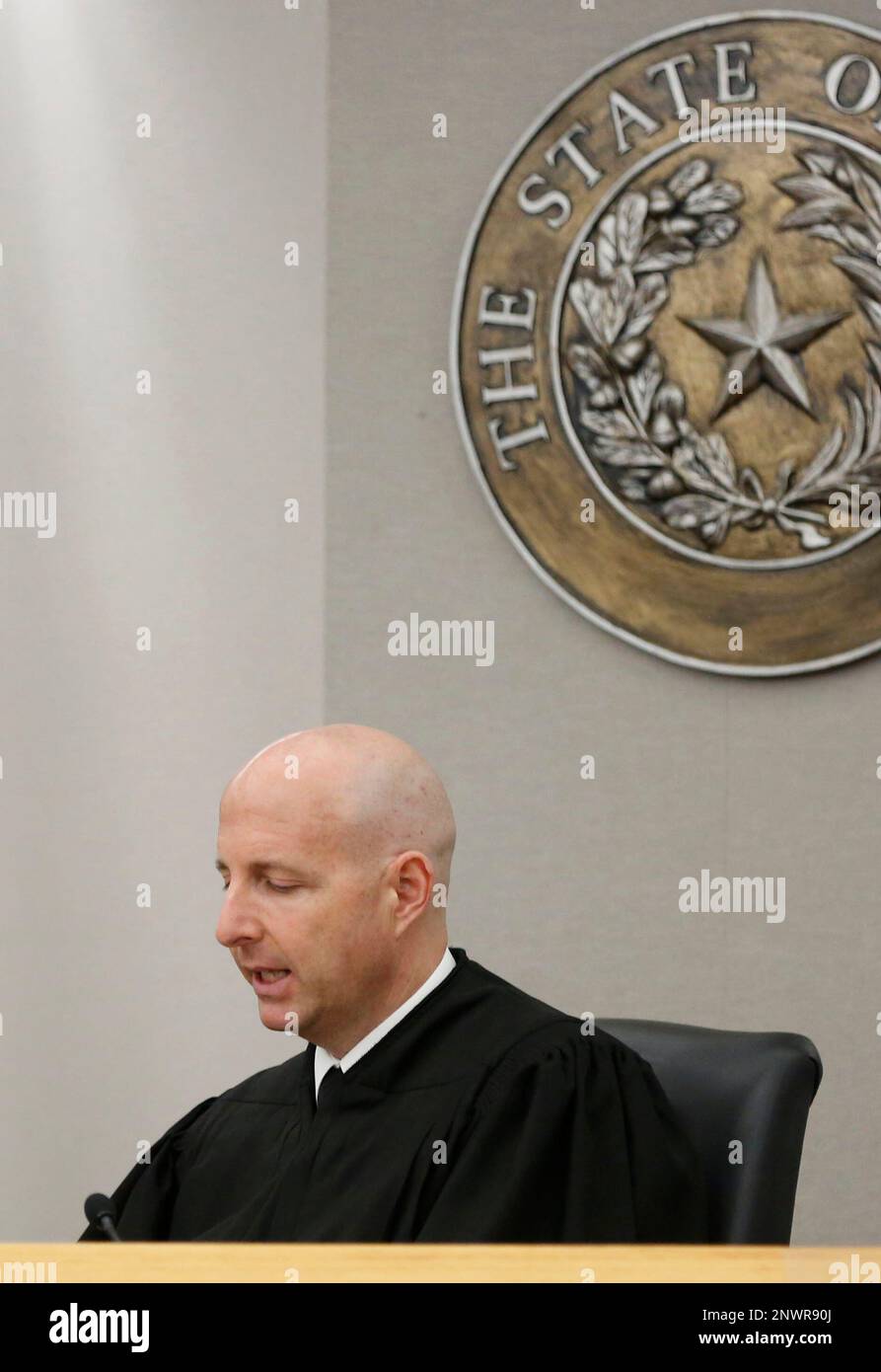 Judge Brandon Birmingham reads the defendant's charges to the jury ...