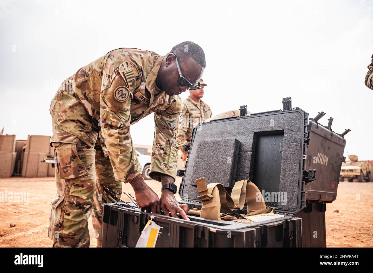 A U.S. Army soldier packs up equipment during an electronic warfare ...