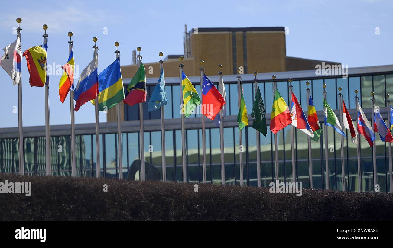 The flags in front of the United Nations Building in New York - street ...