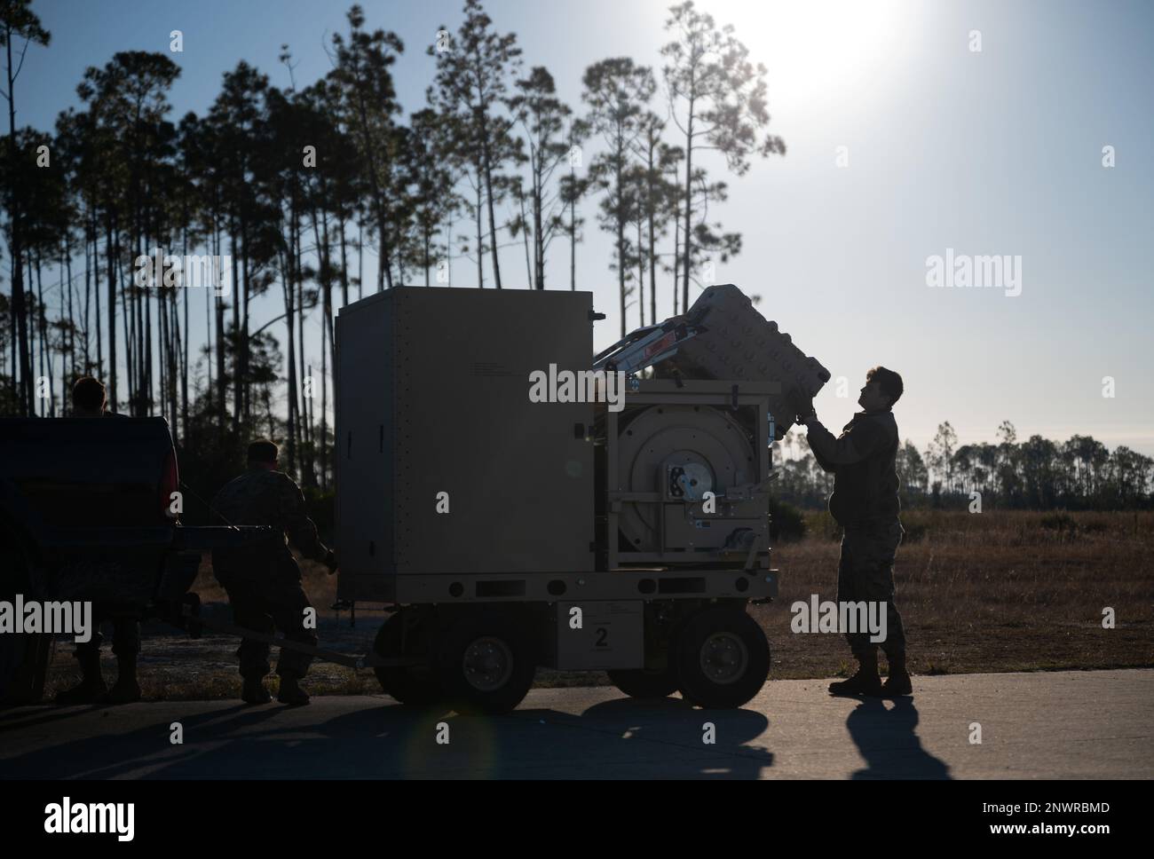 U.S. Airmen unload Expeditionary Airfield Lighting System (EALS-C ...