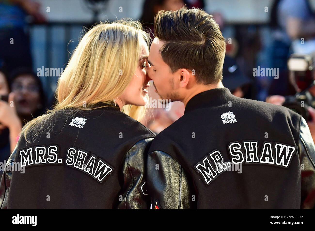 Tyler Shaw, right, and his wife, Alex Karolczyk, arrive on the red ...