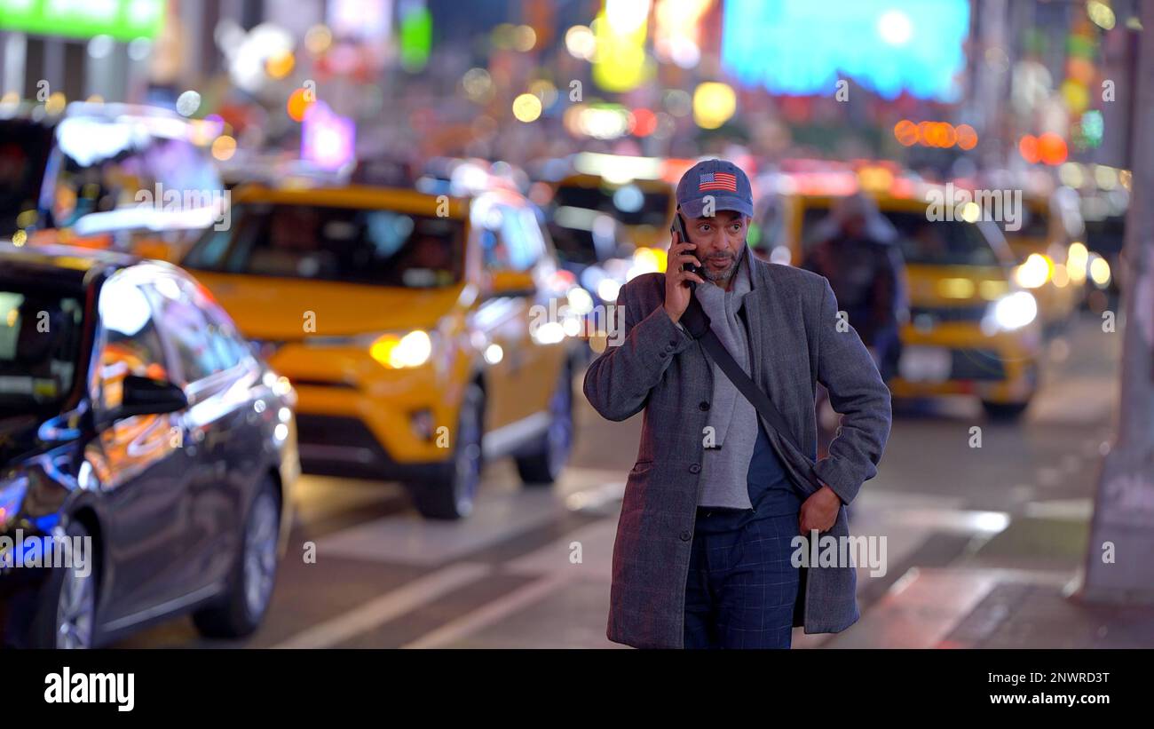 Afro-American Man in the streets of New York at Times Square - street ...