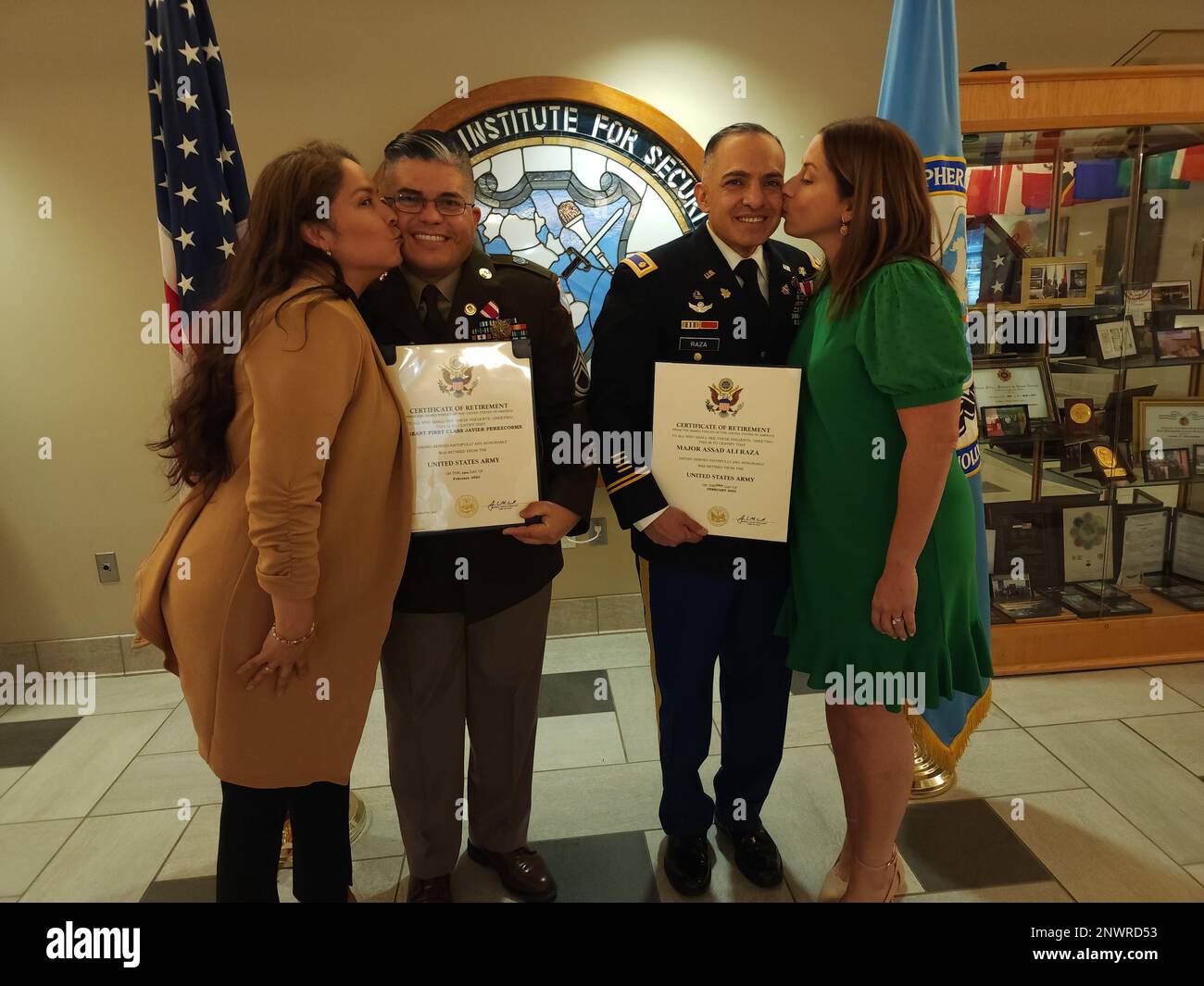 Maj. Assad A Raza, spouse Kathy, Sgt. First Class Javier Perez and ...